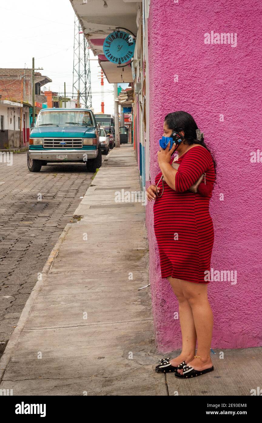 QUESERIA, MEXICO - Sep 28, 2020: Girl wearing red dress stands at ...