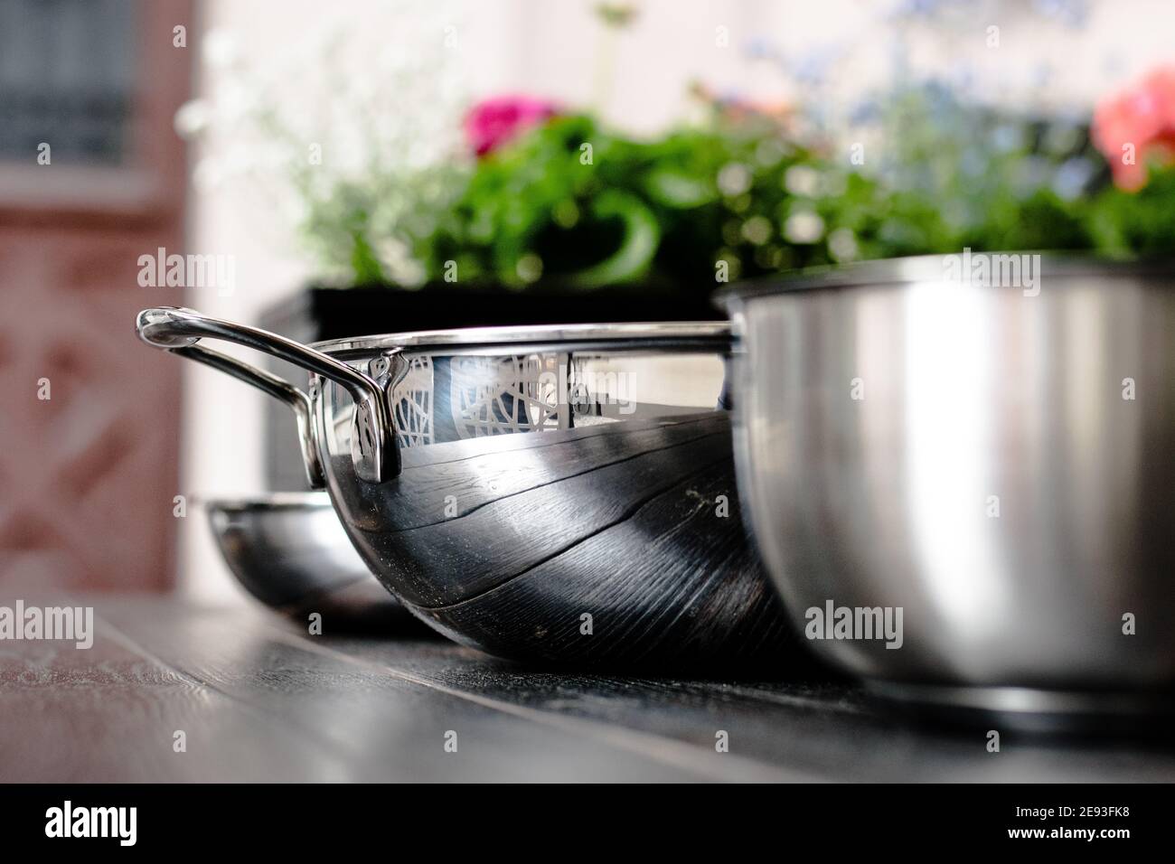Three pans in a row at a restaurant Stock Photo - Alamy
