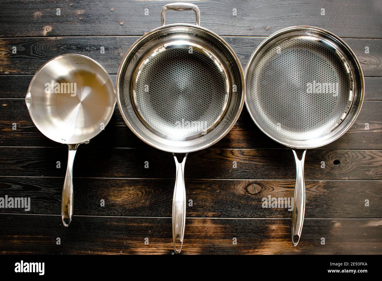 Three pans in a row at a restaurant Stock Photo - Alamy