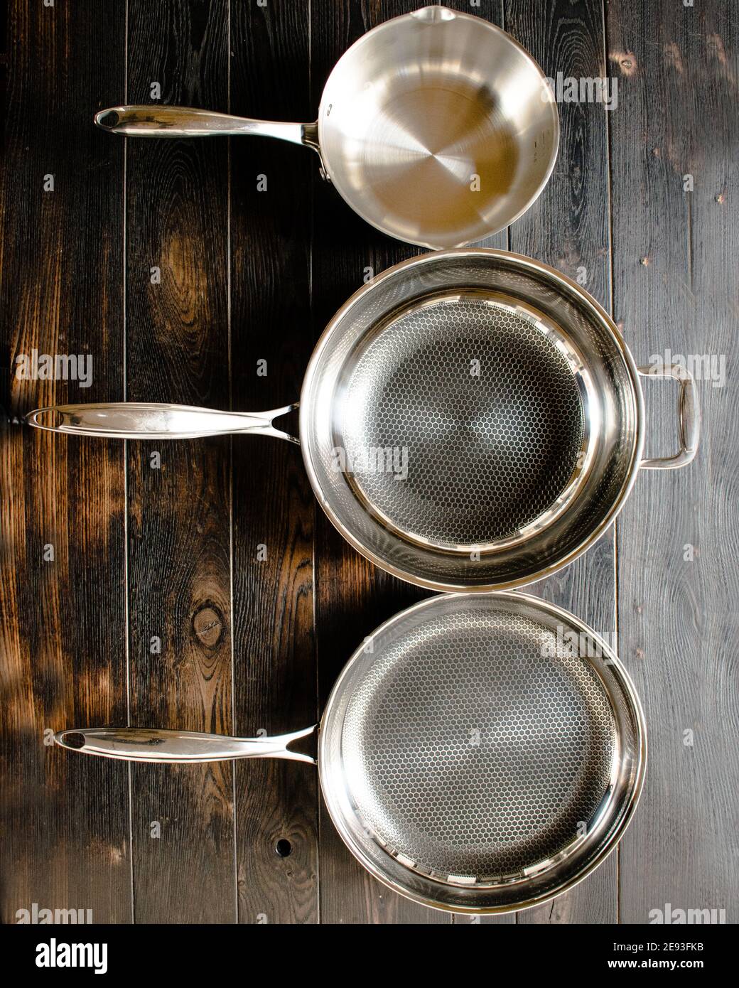 Three pans in a row at a restaurant Stock Photo - Alamy