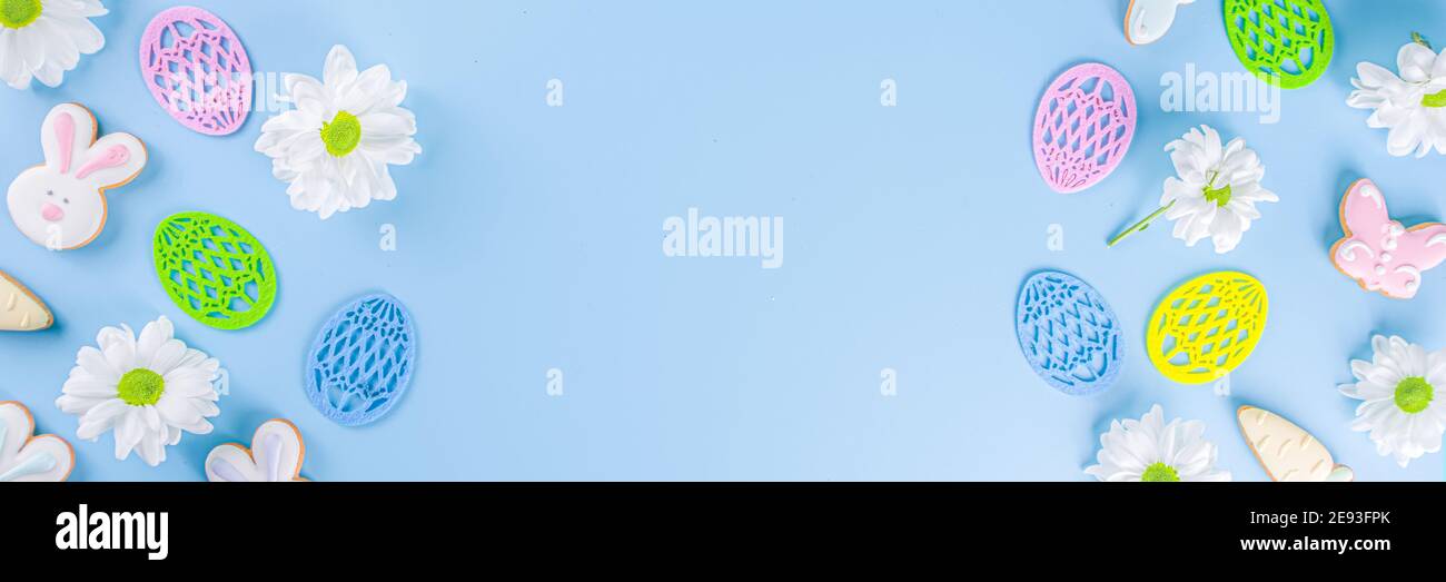 Easter poster background with Easter eggs in nests on light blue ...