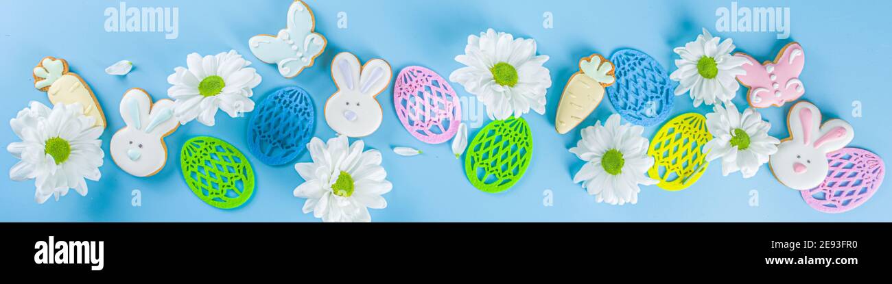 Easter poster background with Easter eggs in nests on light blue ...
