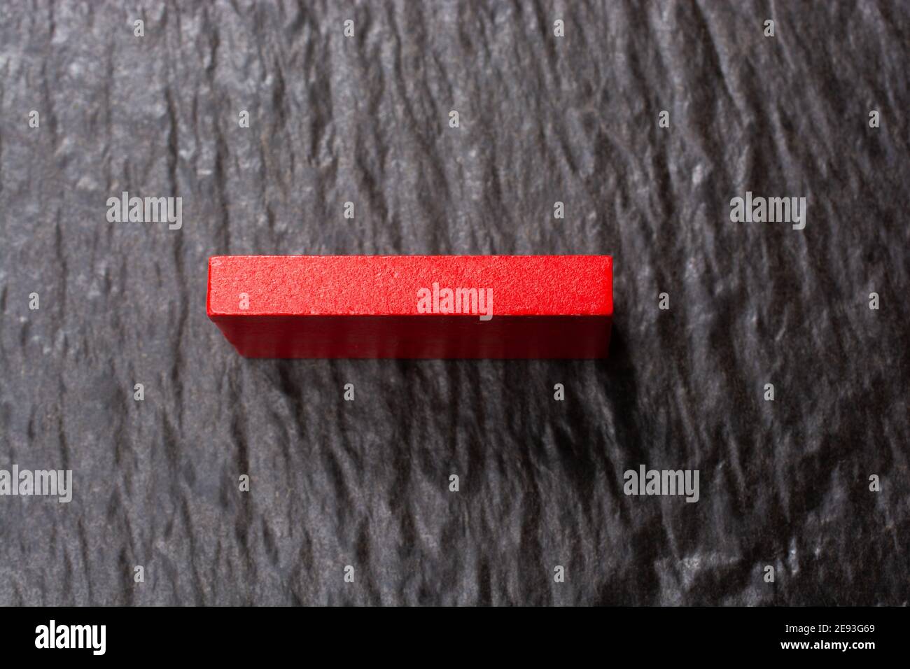 Red color domino blocks placed in view Stock Photo - Alamy