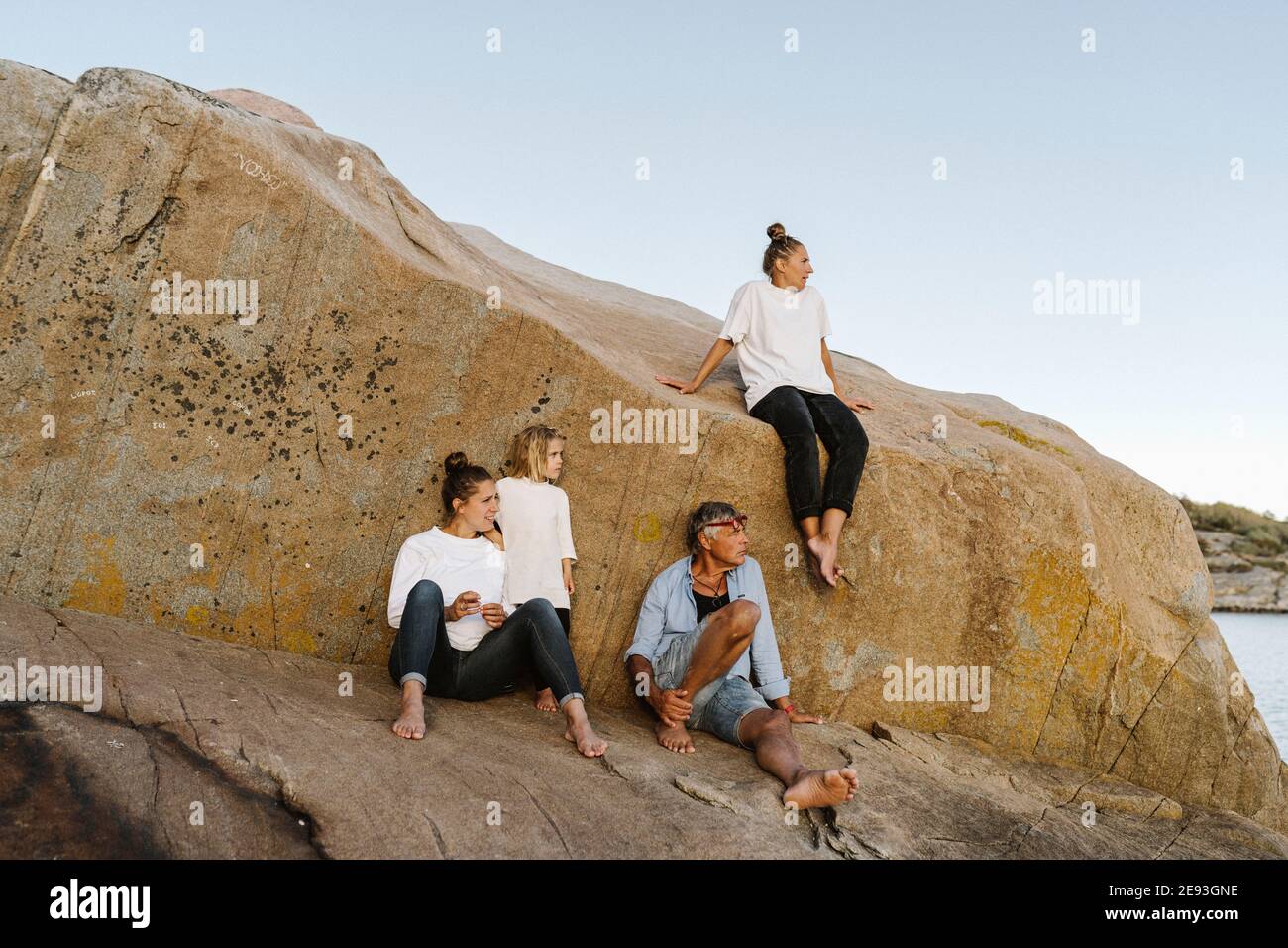 Family relaxing at sea Stock Photo - Alamy