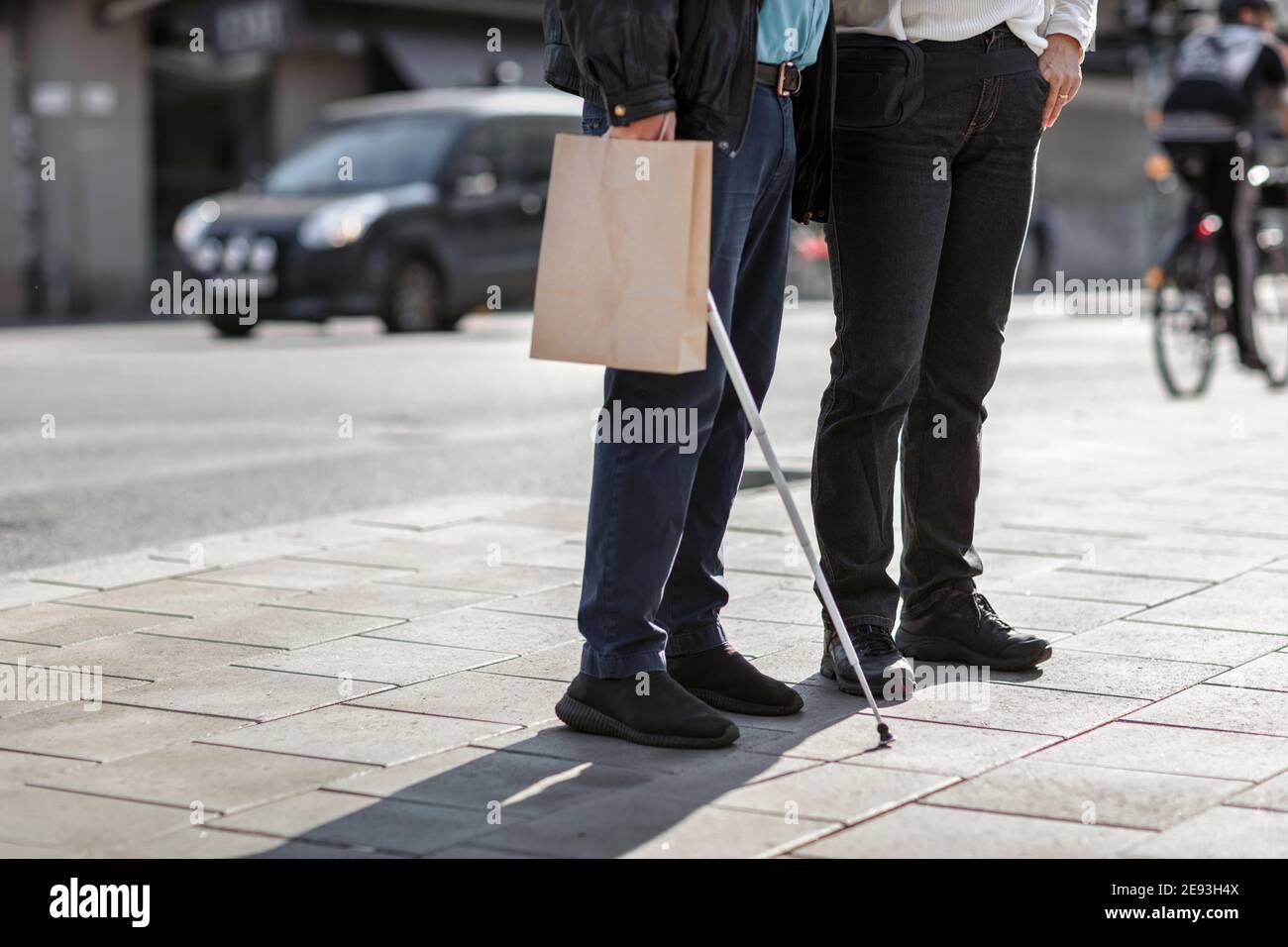 Low angle view of couple standing Stock Photo - Alamy
