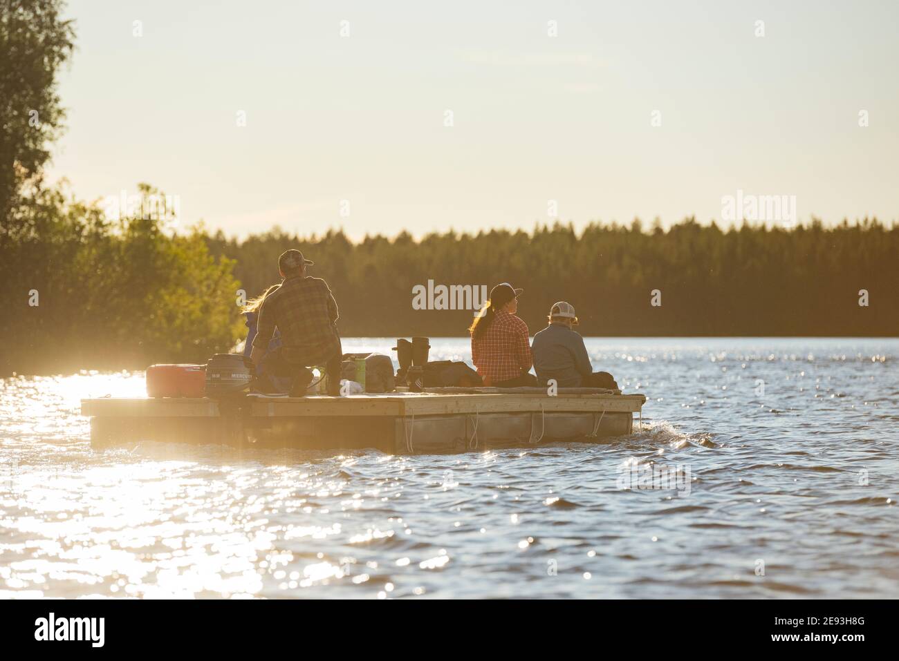 People on motor raft Stock Photo - Alamy