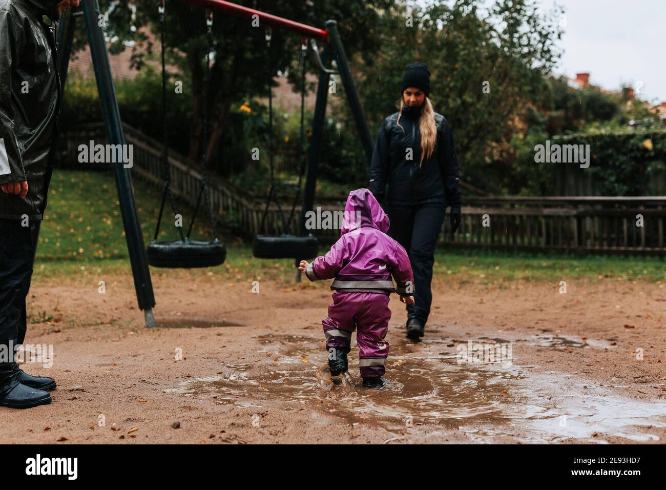 Walking through puddle hi-res stock photography and images - Alamy