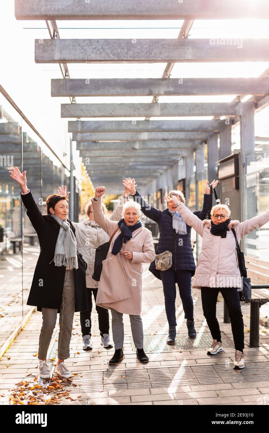 Old women waving hi-res stock photography and images - Alamy