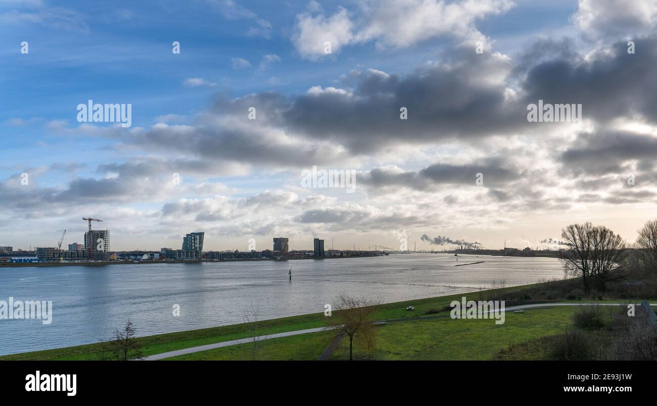 Construction site during the day at the edge of a lake Stock Photo - Alamy