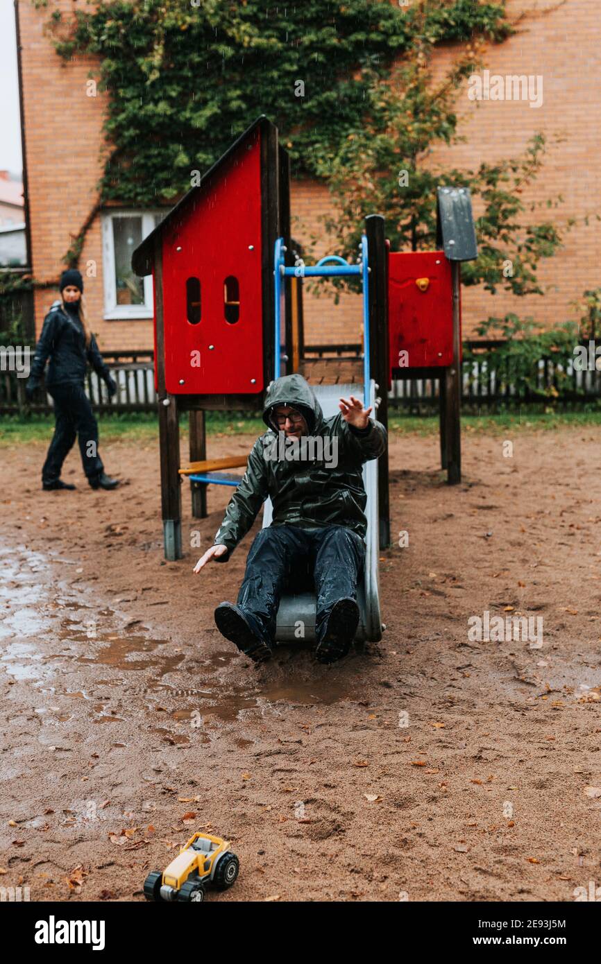 Man Playground Slide High Resolution Stock Photography and Images - Alamy