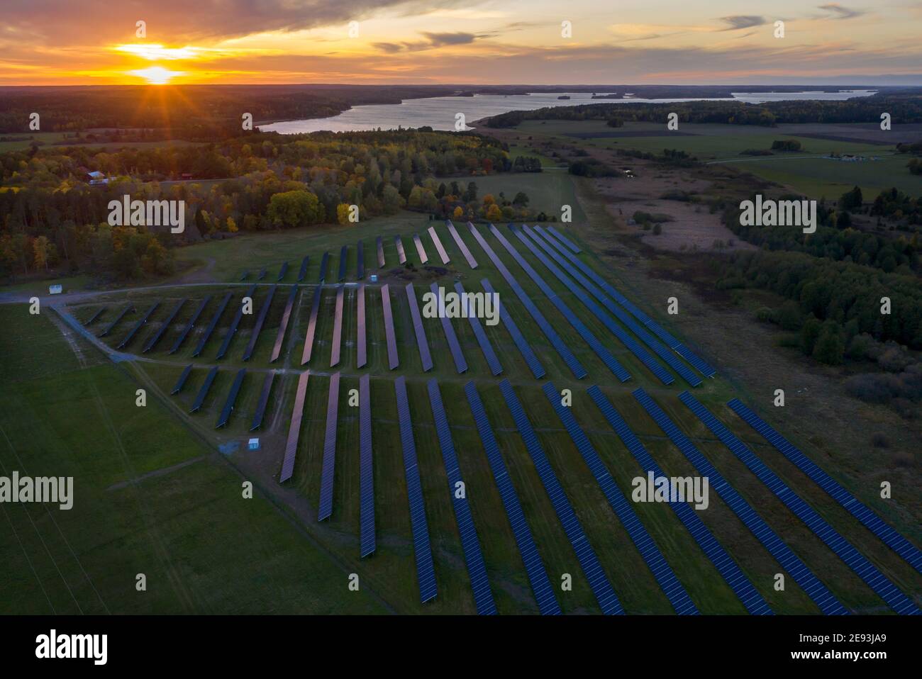 Aerial view of solar farm at sunset Stock Photo - Alamy