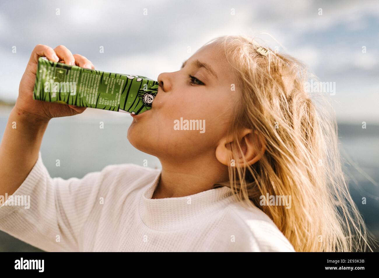 Girl drink side hi-res stock photography and images - Alamy