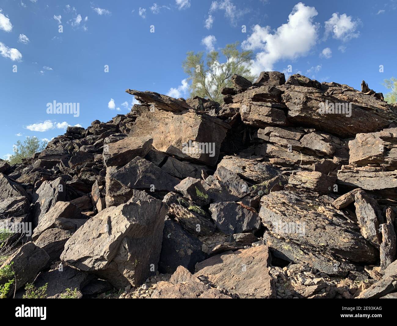 Tack of black volcanic rocks on top of a mountain in Phoenix, Arizona ...