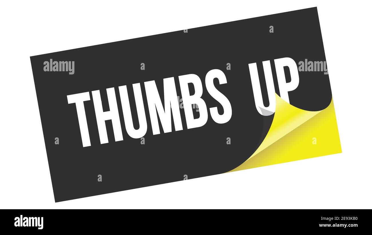 THUMBS UP text written on black yellow sticker stamp Stock Photo - Alamy