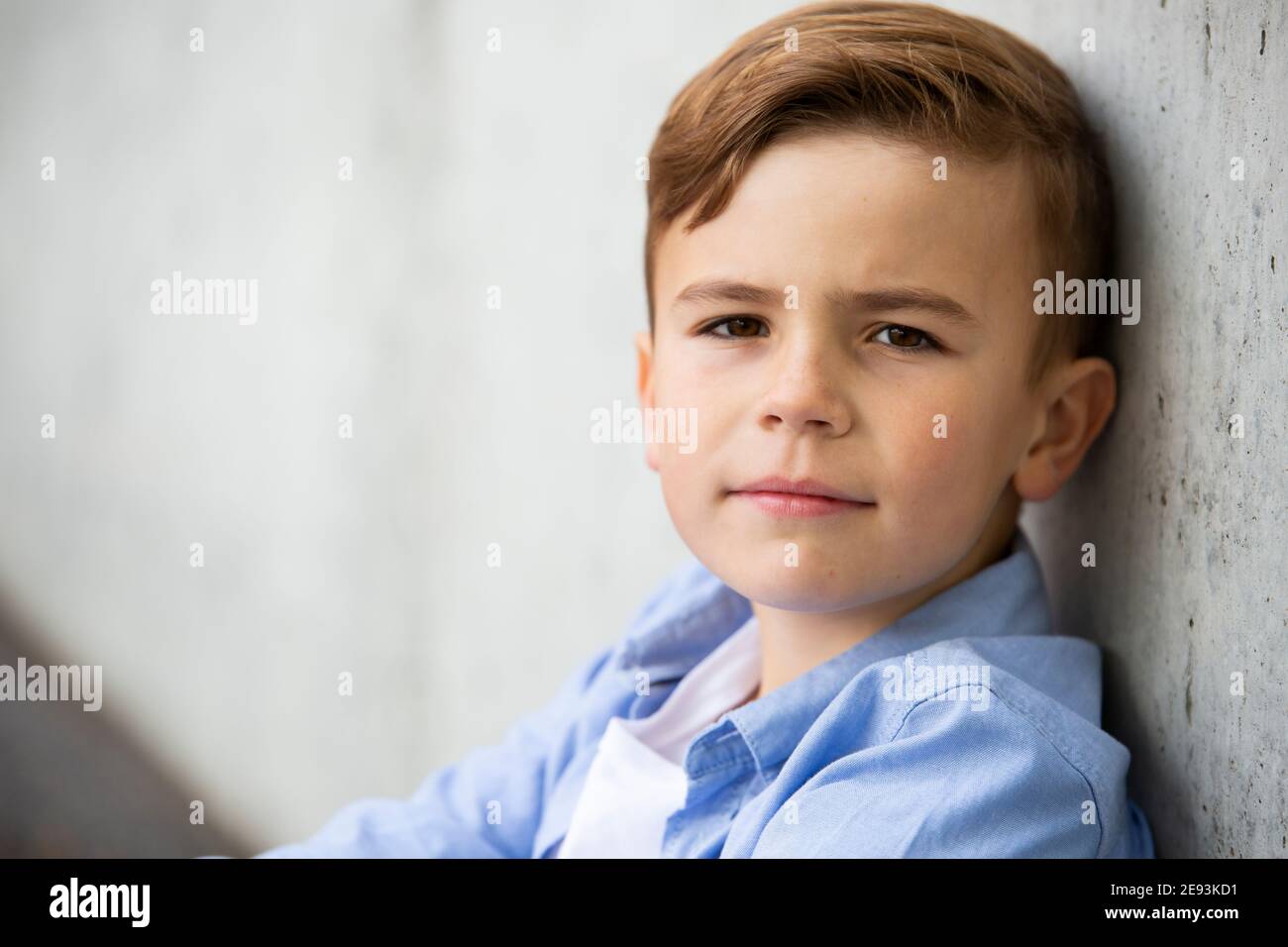 Portrait of boy looking at camera Stock Photo - Alamy
