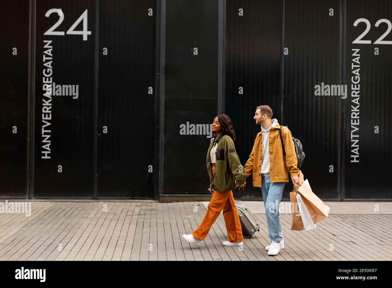 Couple waling together Stock Photo - Alamy