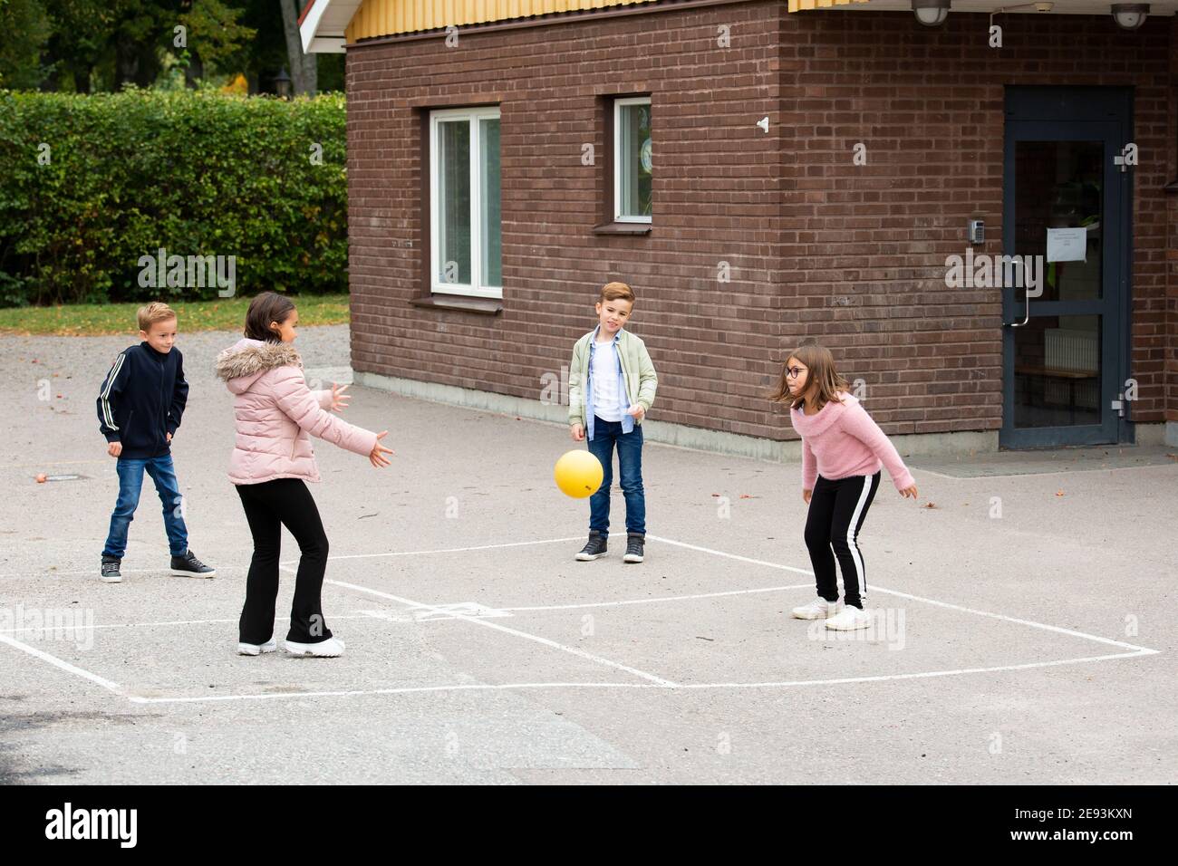 Children playing at school yard Stock Photo - Alamy