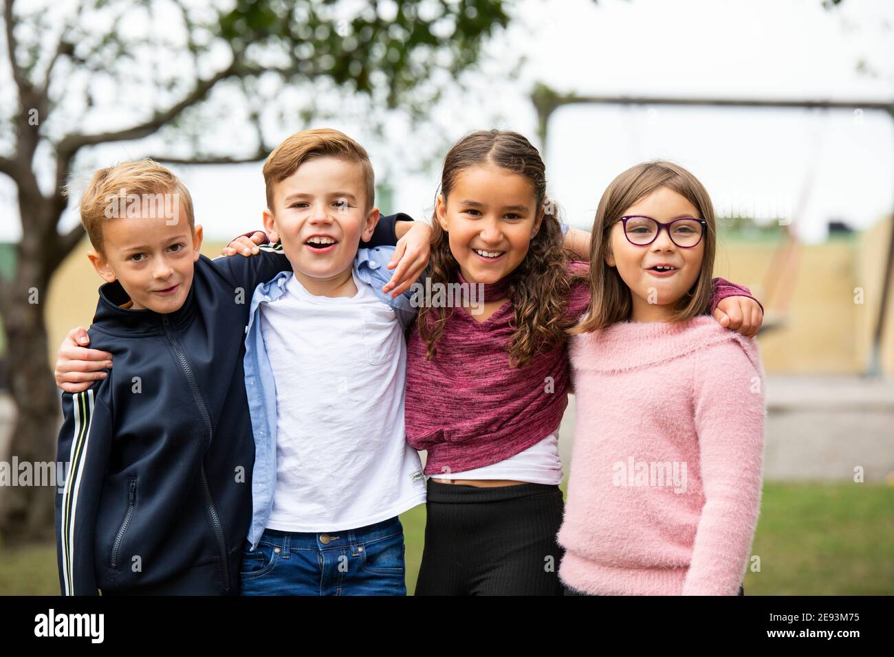 Group happy children smiling camera hi-res stock photography and images ...