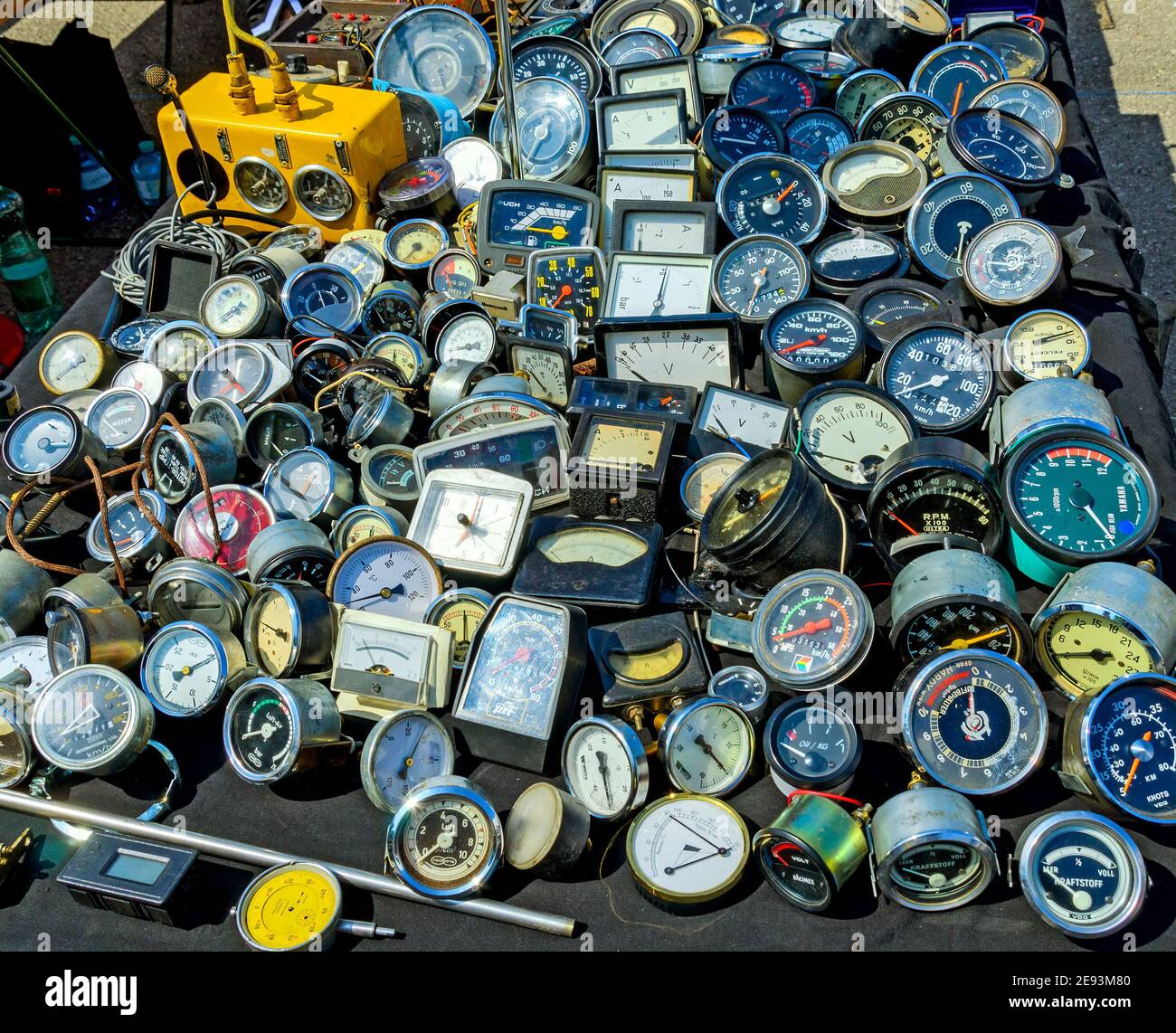 old indicating instruments of cars on a market stall on a fair for ...