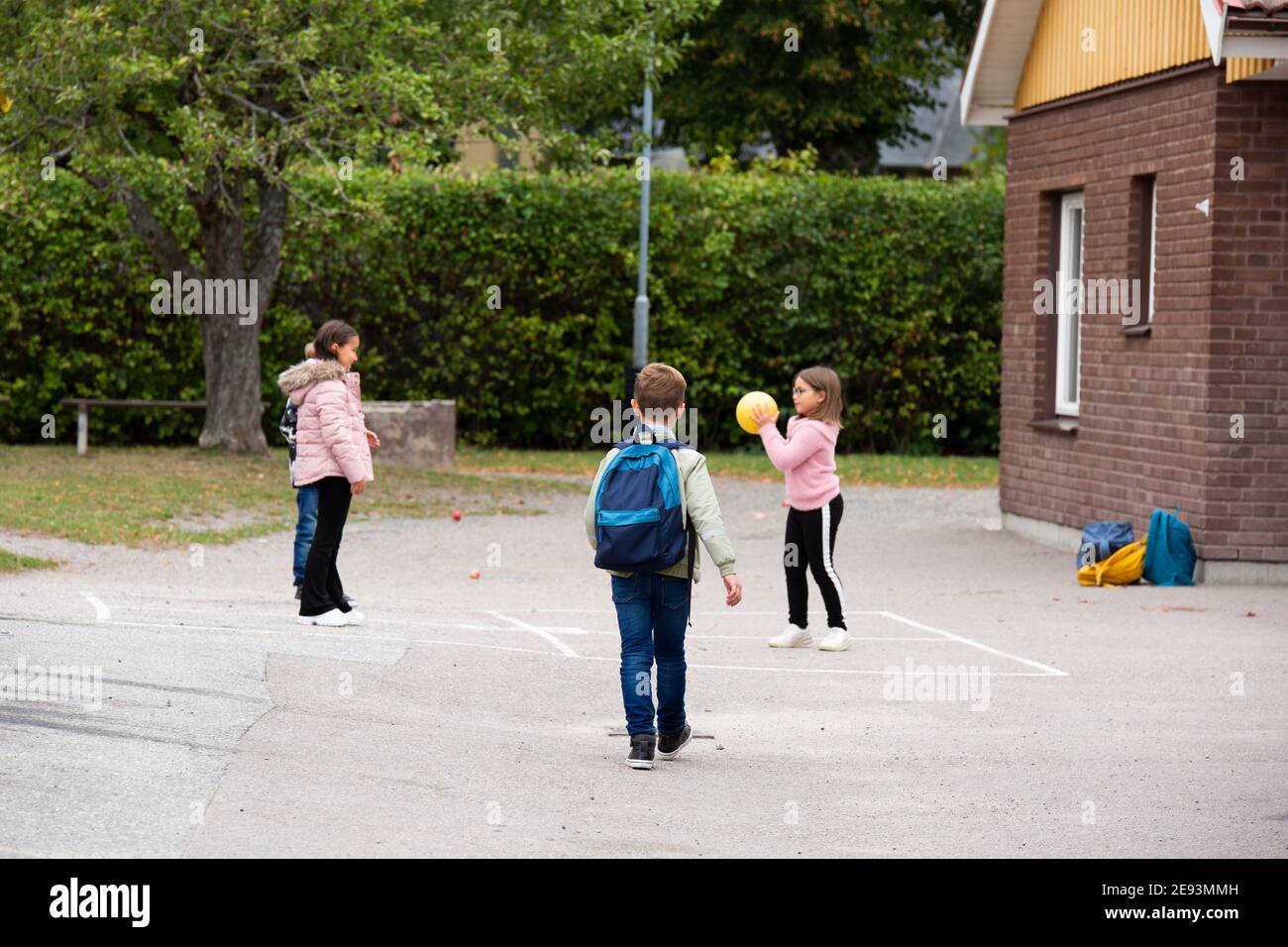 Children playing at school yard Stock Photo - Alamy