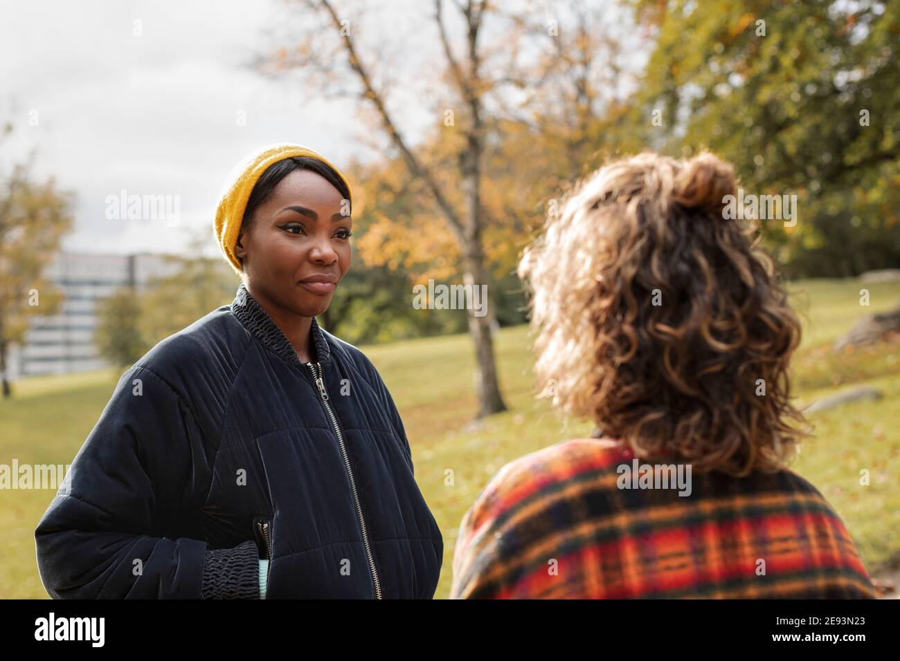 Young positive couple talking friend hi-res stock photography and ...