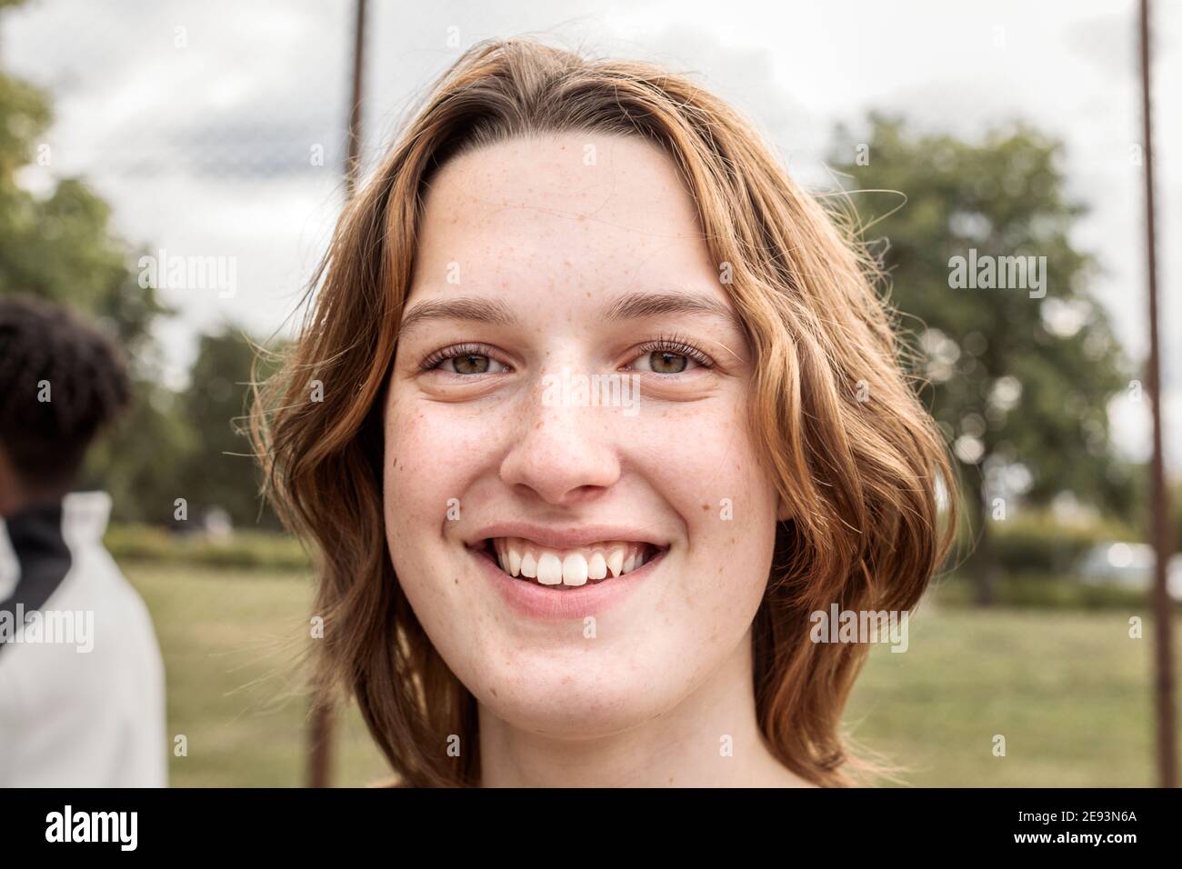 Portrait of teenage girl looking at camera Stock Photo - Alamy