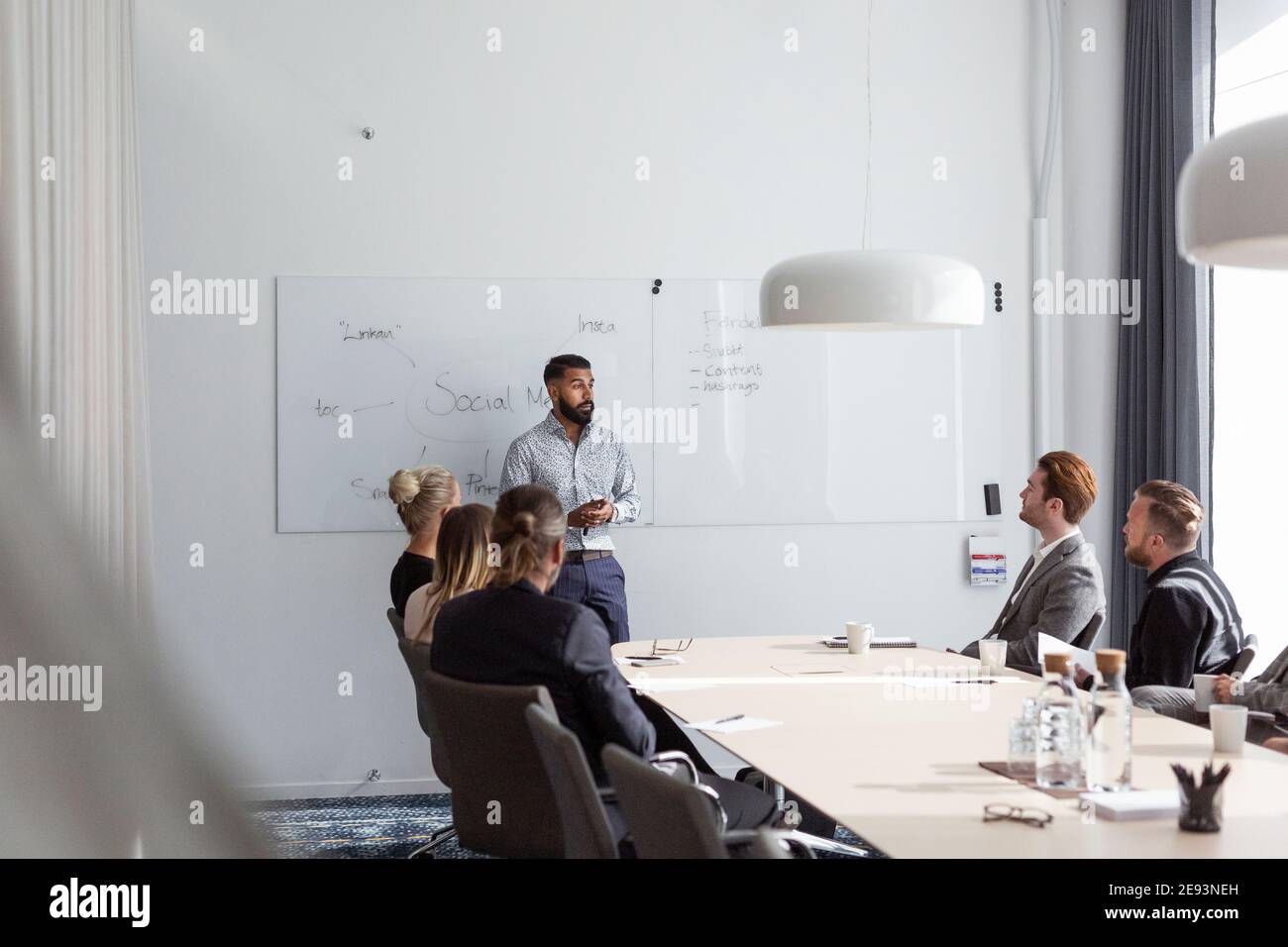 Man having presentation at business meeting Stock Photo - Alamy