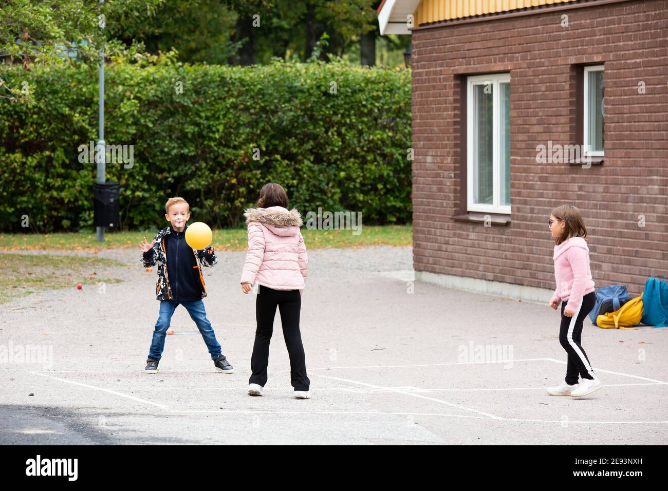 Children playing at school yard Stock Photo - Alamy