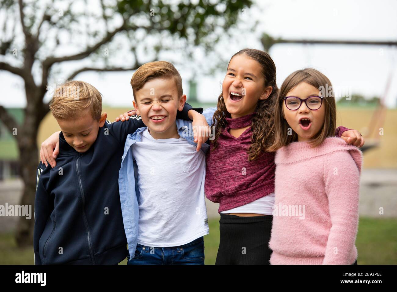 Smiling children looking away Stock Photo - Alamy