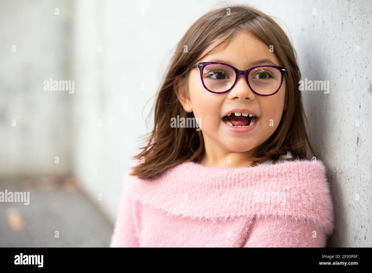 Happy girl looking away Stock Photo - Alamy