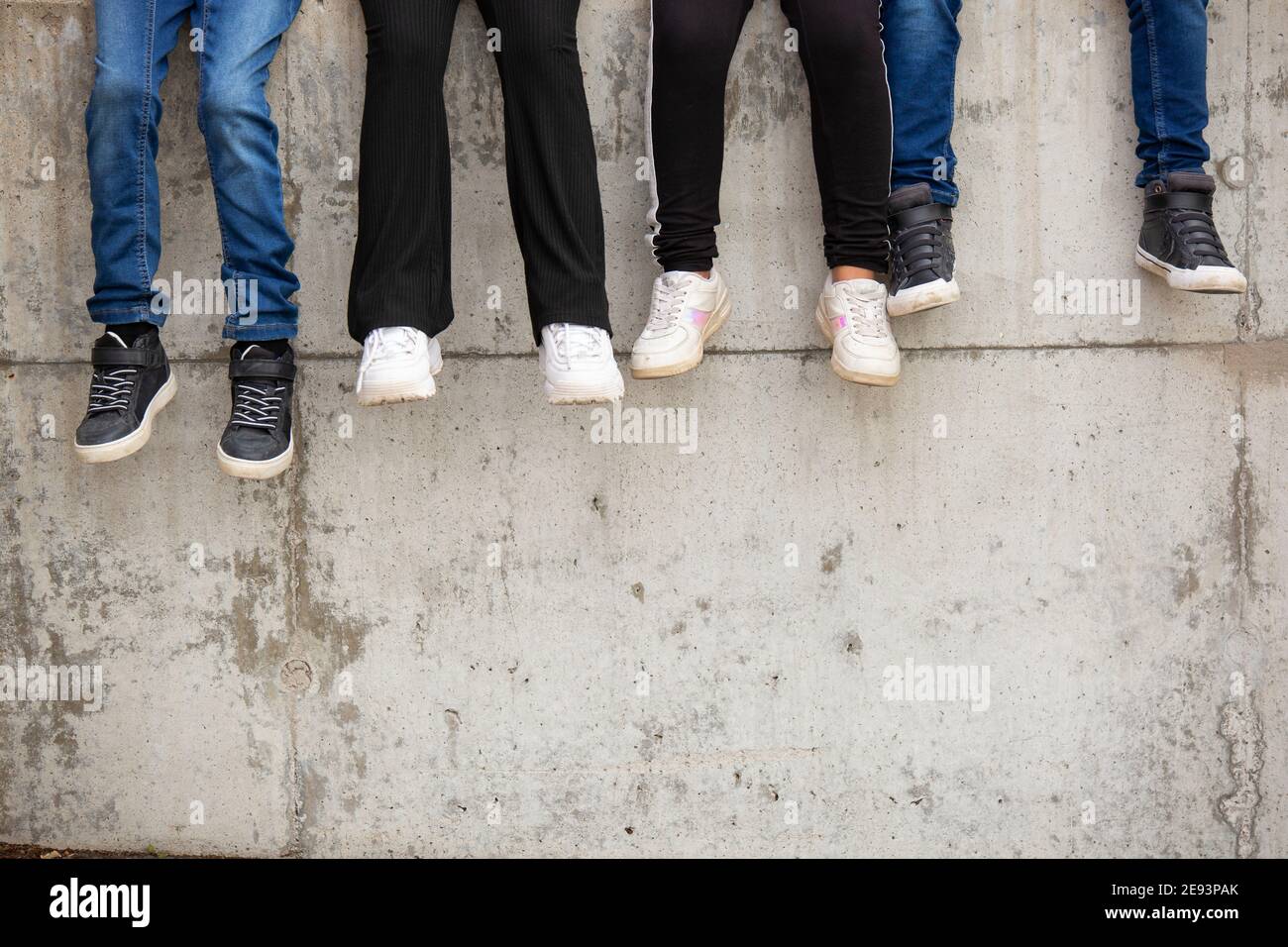 Low section of kids sitting Stock Photo - Alamy
