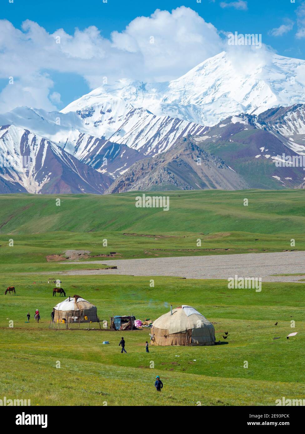 Traditional yurt in the Alaj valley with the Transalai mountains in the ...