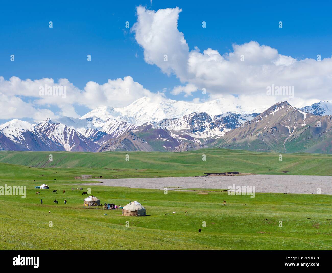 Traditional yurt in the Alaj valley with the Transalai mountains in the ...