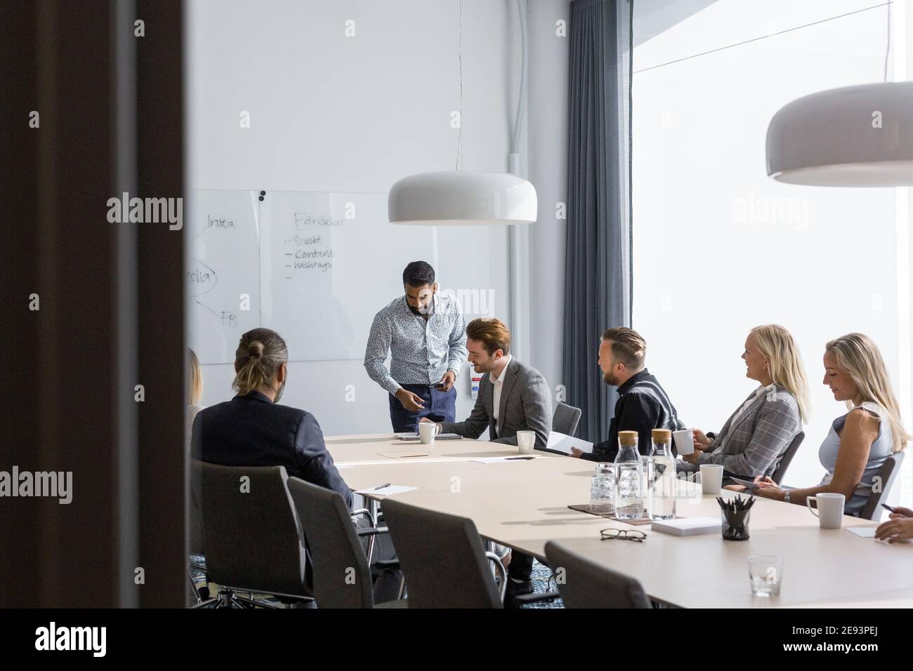 Man having presentation at business meeting Stock Photo - Alamy