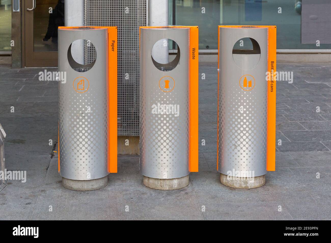 Three Recycling Bins For Sorting Waste in City Stock Photo - Alamy