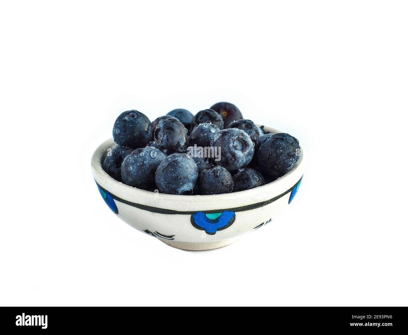Fresh blueberries in bowl isolated on white background Stock Photo - Alamy