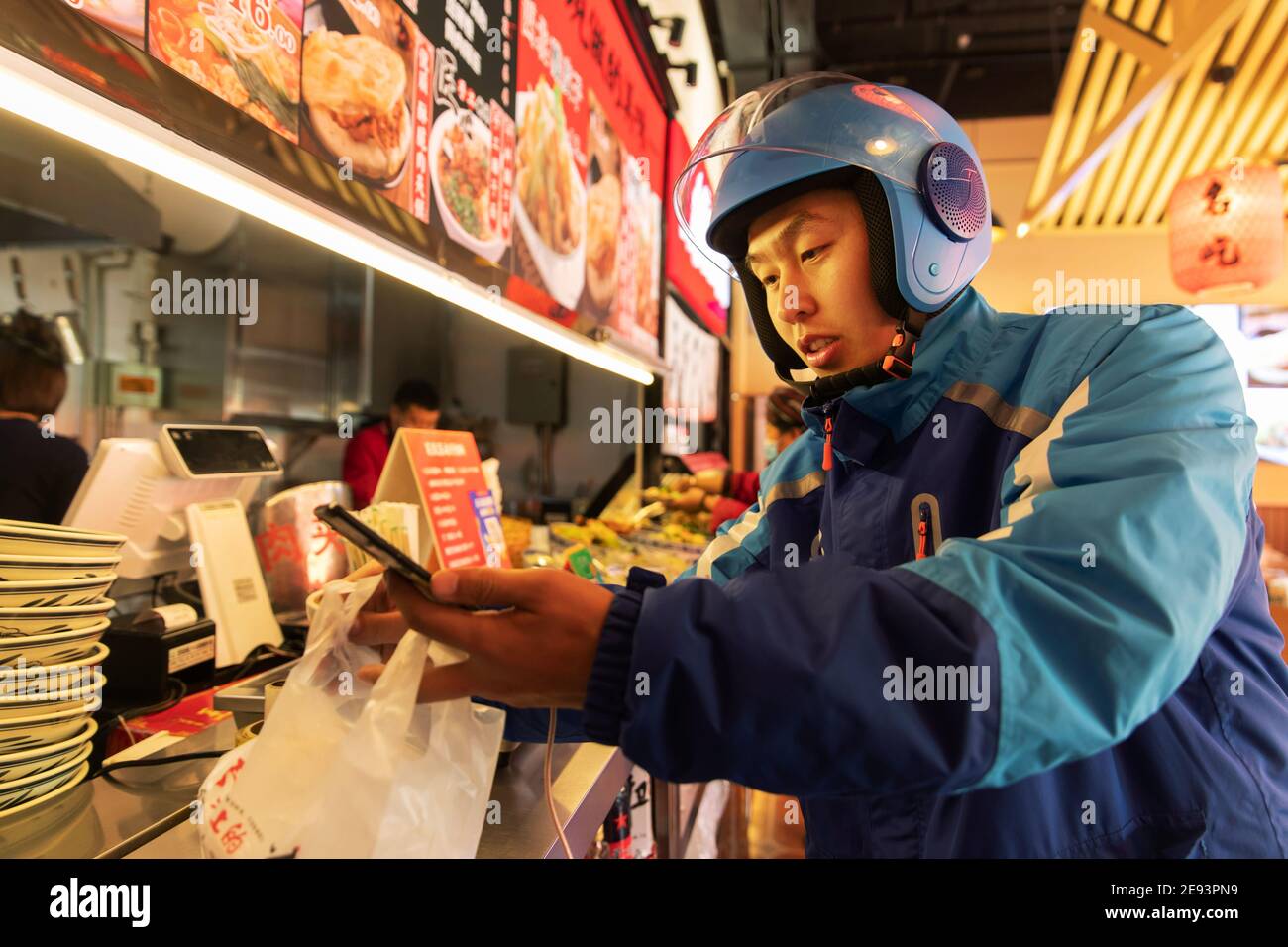 Take-away member take food in the restaurant Stock Photo - Alamy