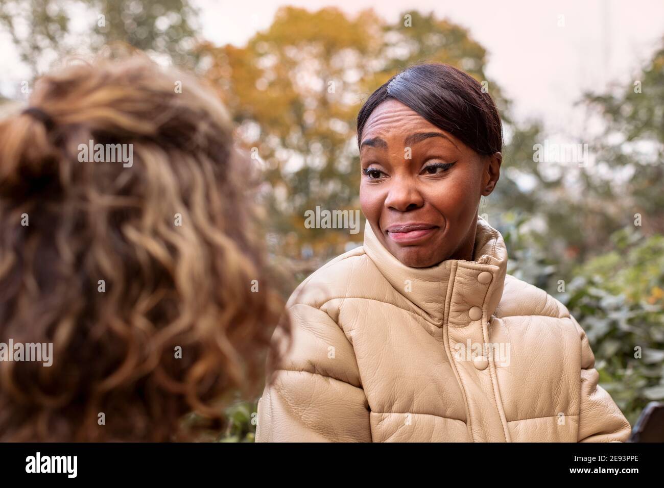 Young positive couple talking friend hi-res stock photography and ...