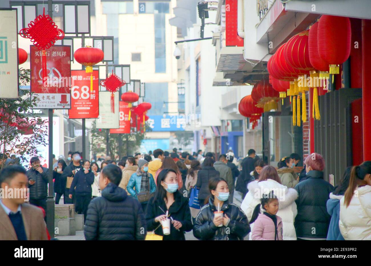 SUZHOU, CHINA - FEBRUARY 2, 2021 - People stroll along a Guanqian ...