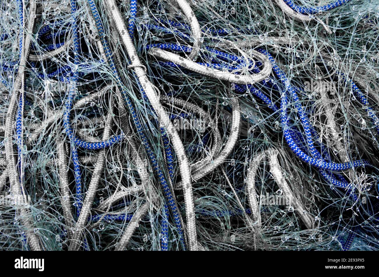 Closeup shot of tangled wet fishing nets Stock Photo - Alamy