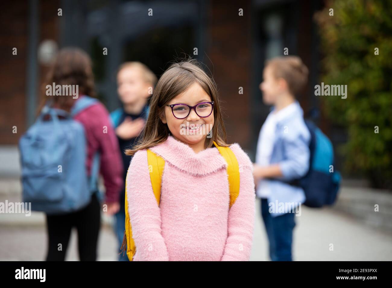 Girl looking at camera Stock Photo - Alamy