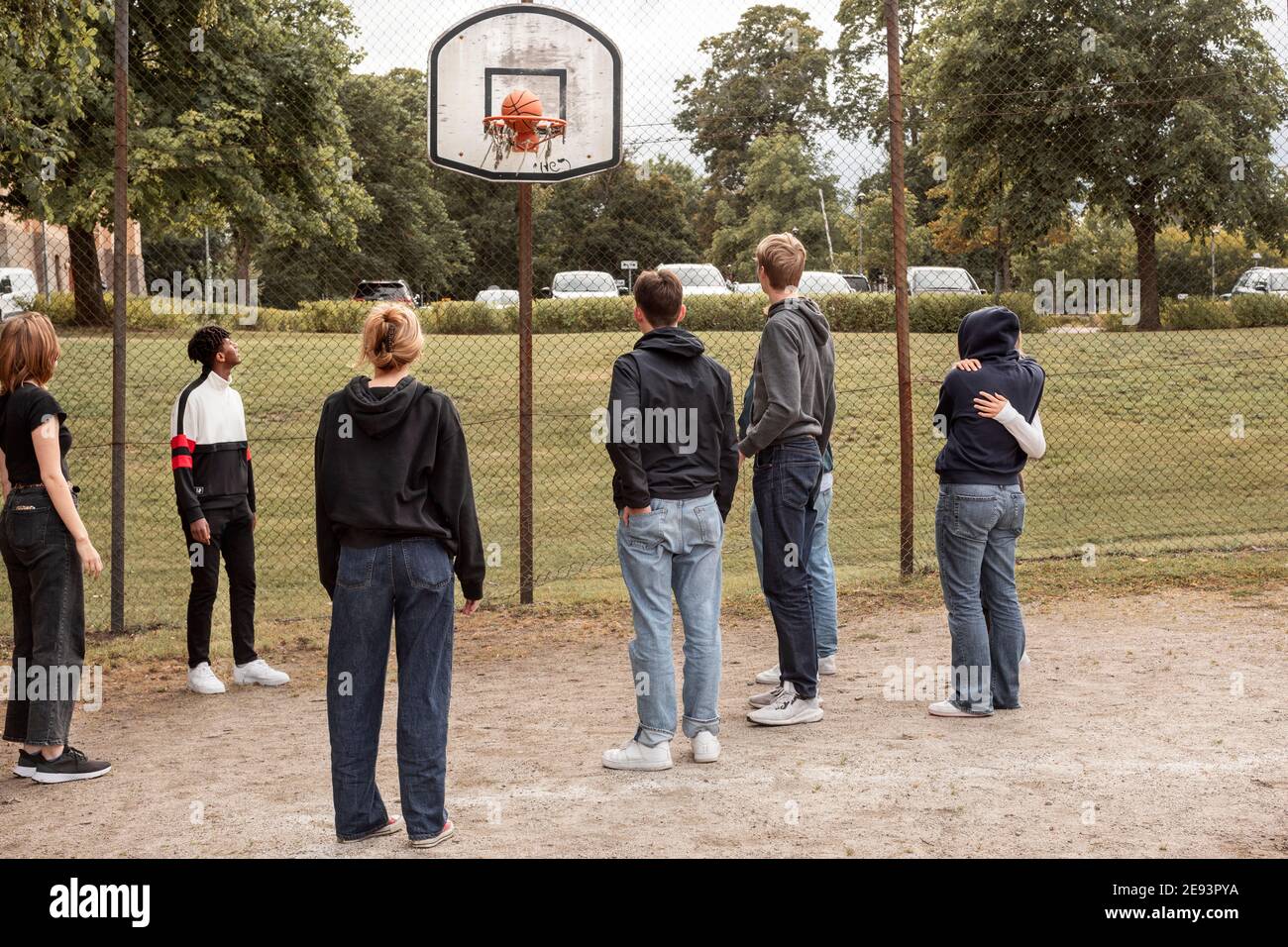 Teenagers playing basketball Stock Photo - Alamy