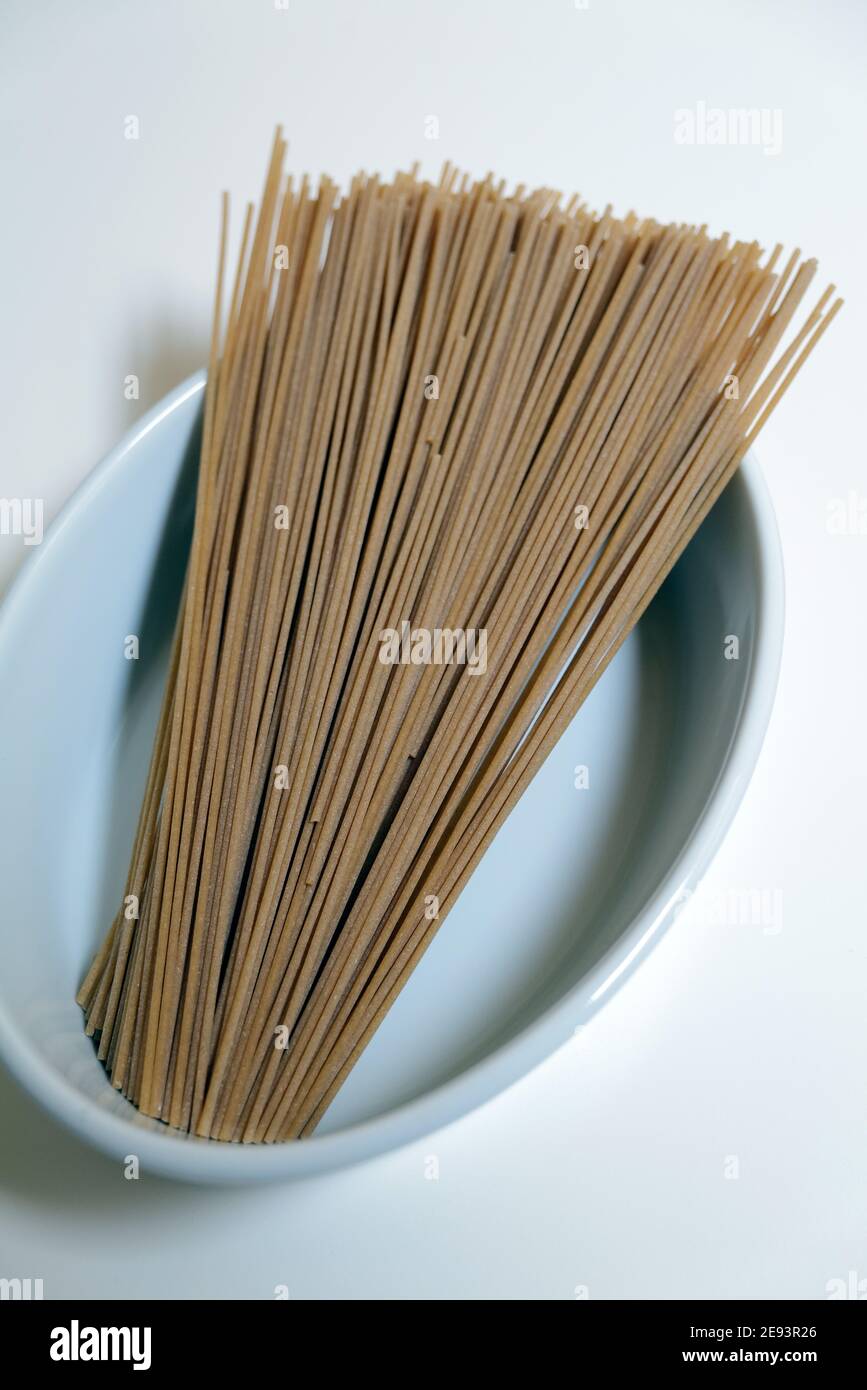 Brown italian spaghetti Stock Photo - Alamy