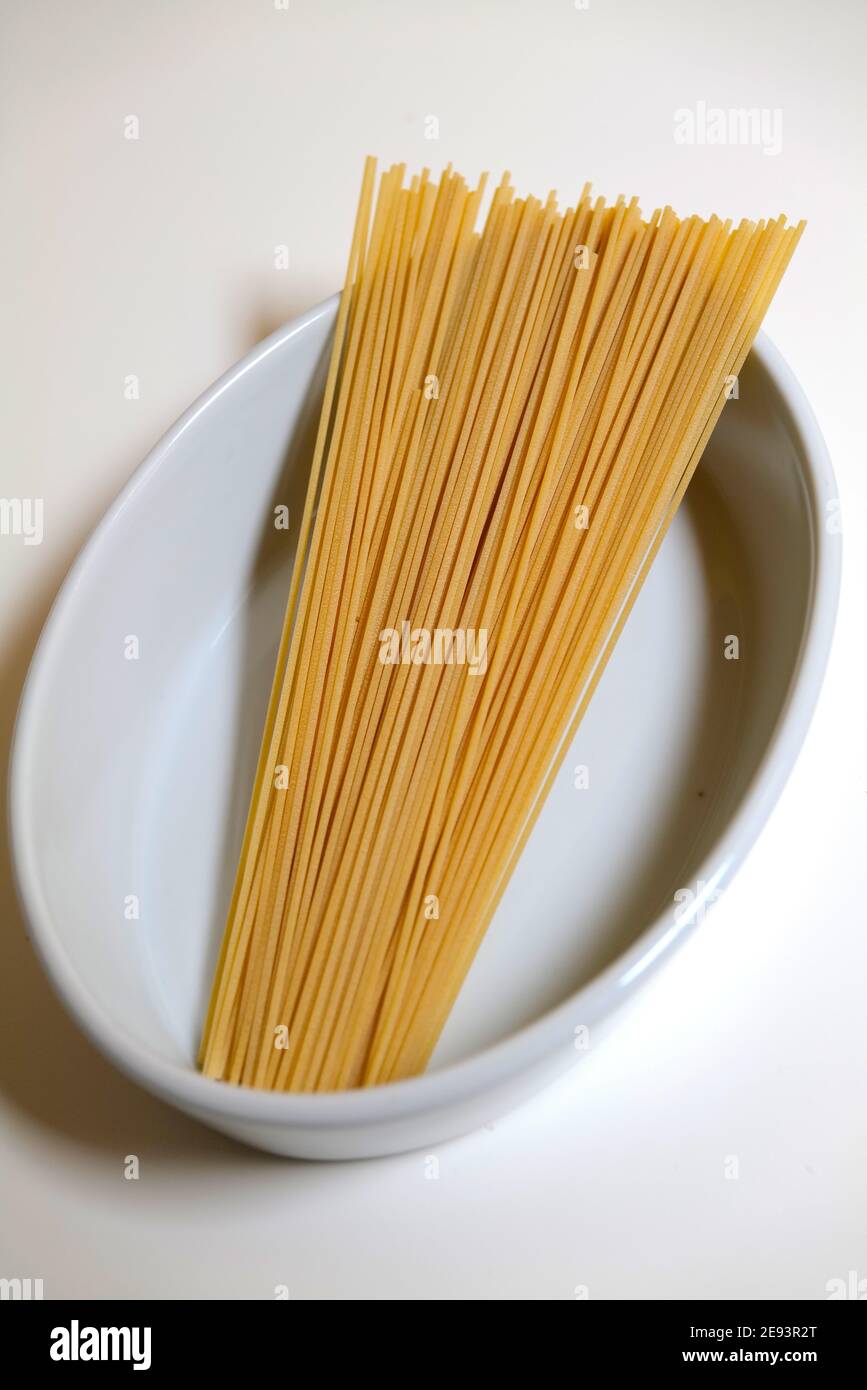 Italian spaghetti not cooked Stock Photo - Alamy