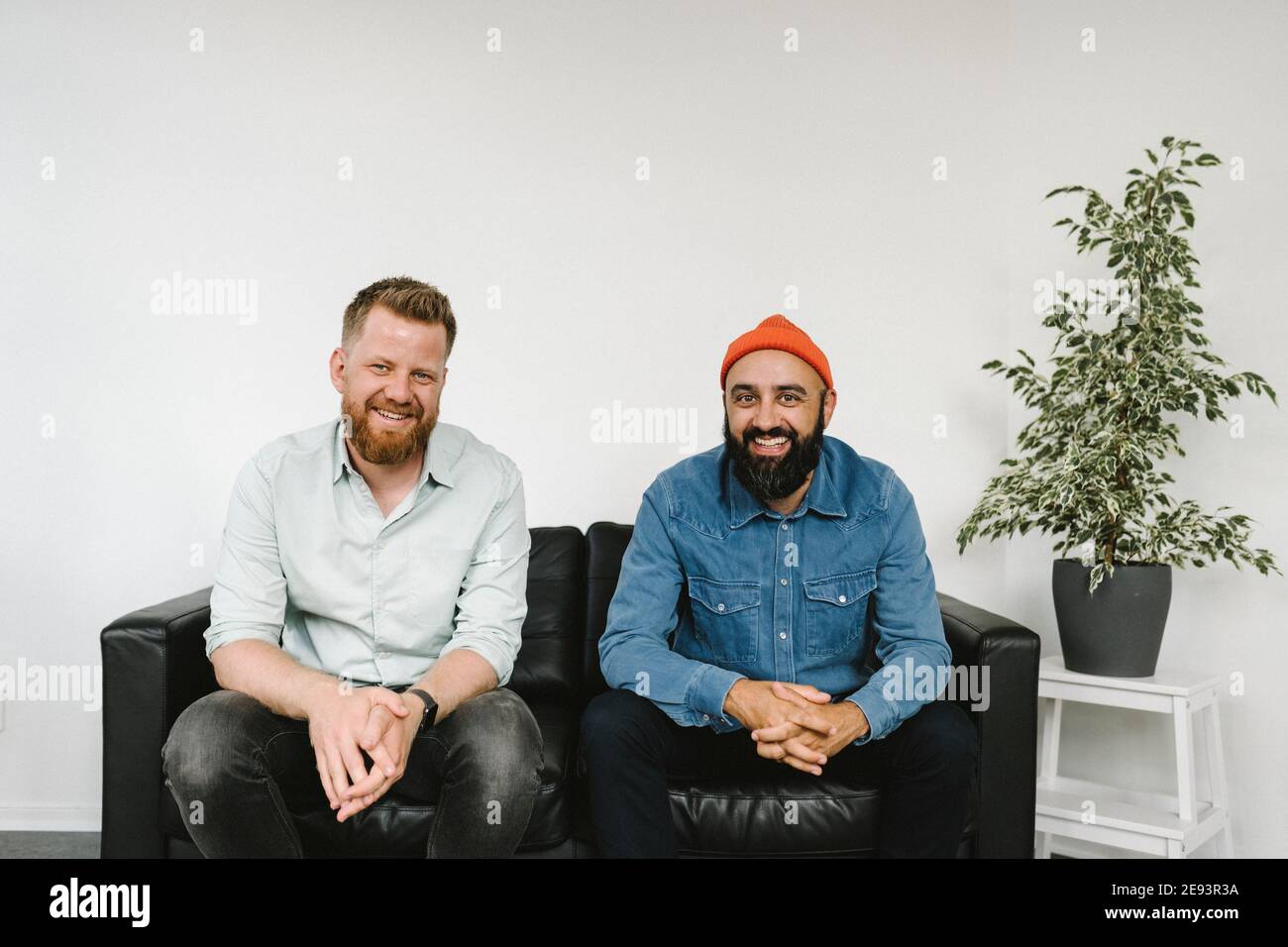 Multi ethnic people siting together hi-res stock photography and images ...