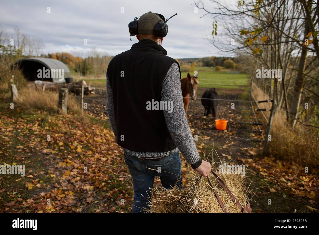 Farmer with straw hi-res stock photography and images - Alamy