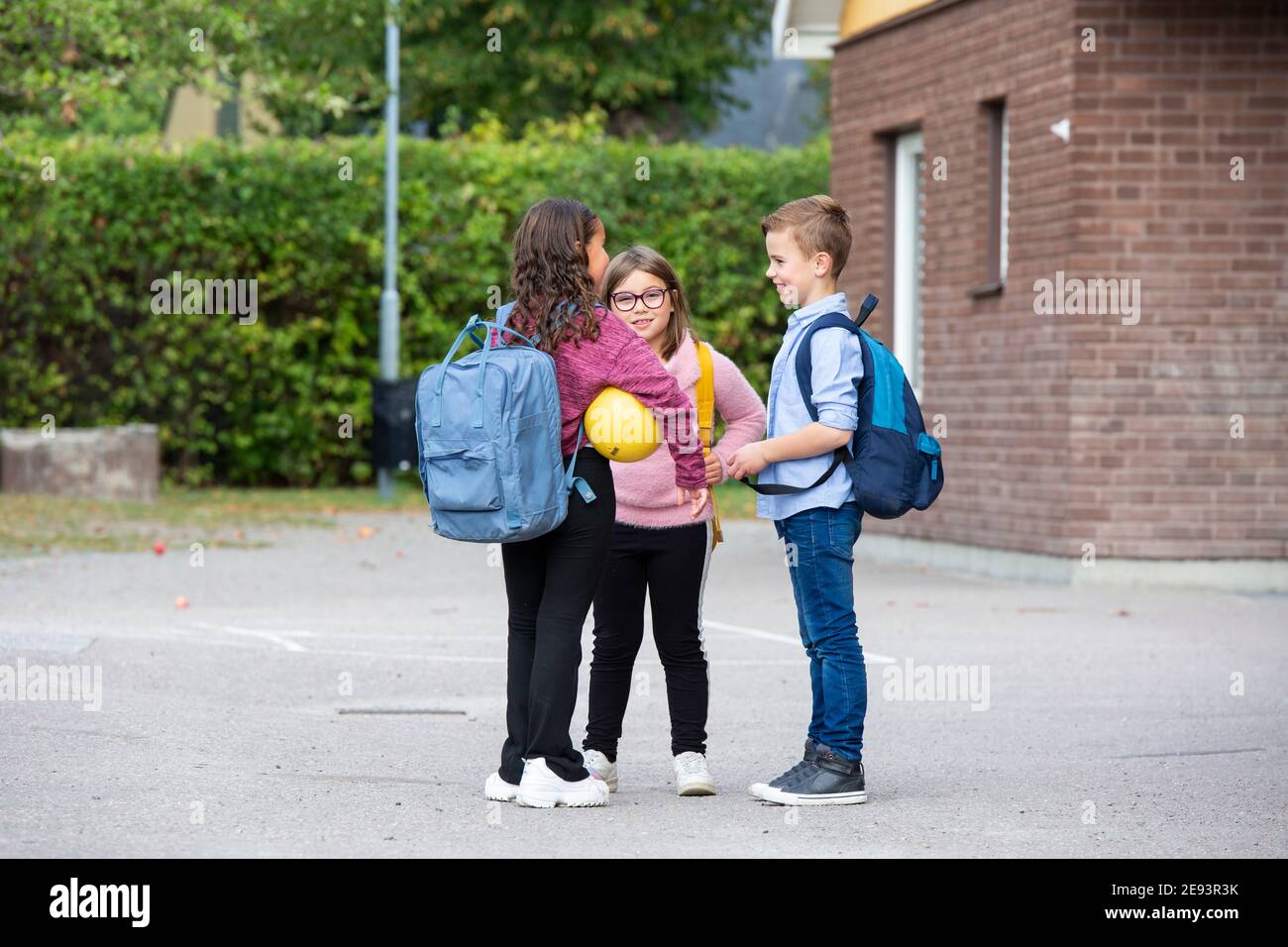 Boy and girl talking school hi-res stock photography and images - Alamy