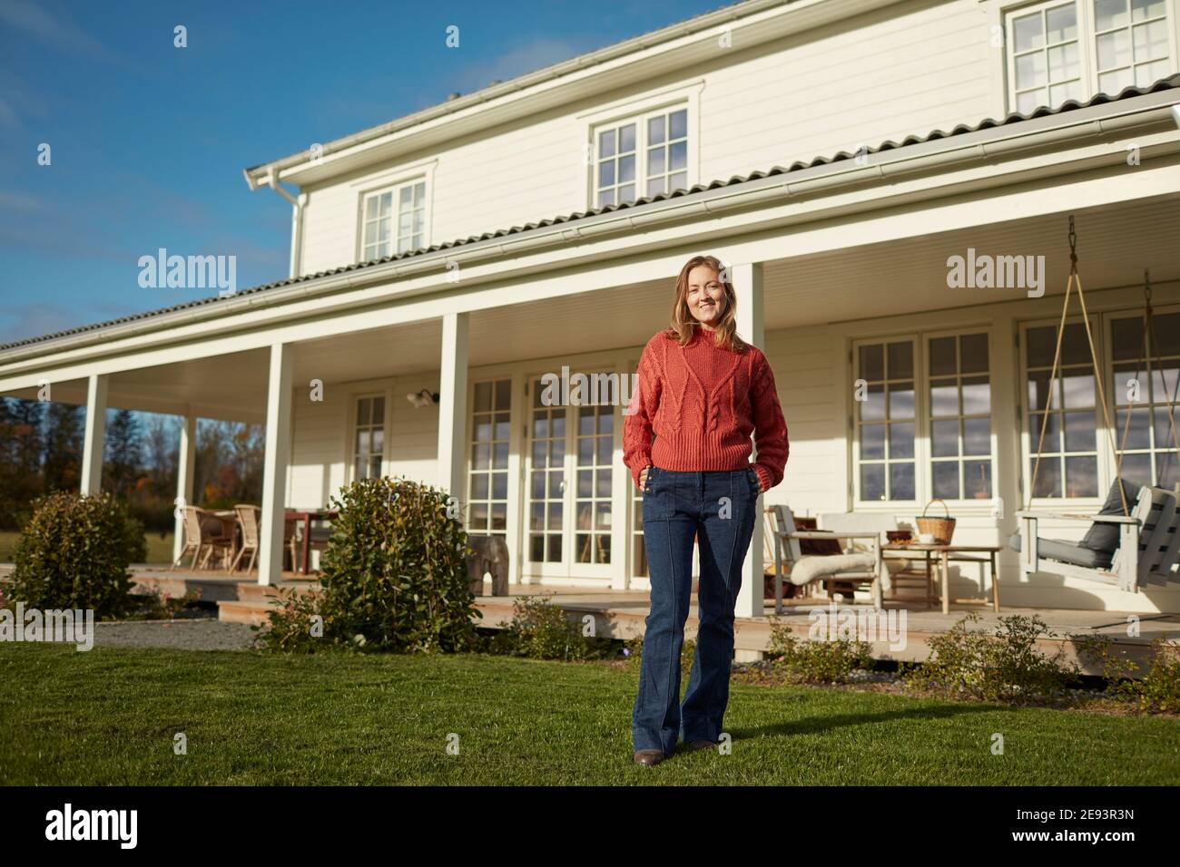 Woman front lawn house hi-res stock photography and images - Alamy