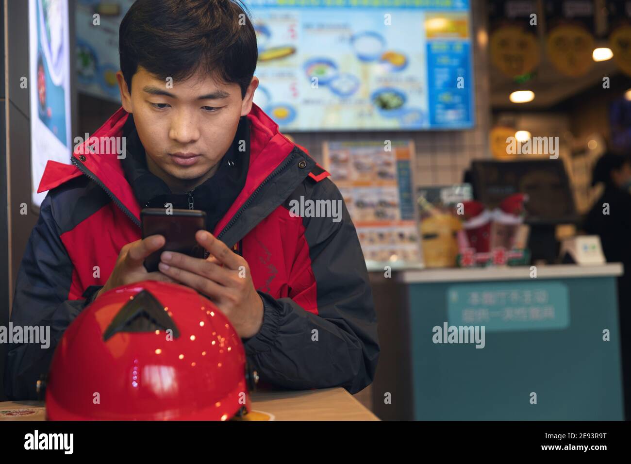 Take-out restaurant where the use of mobile phones Stock Photo - Alamy