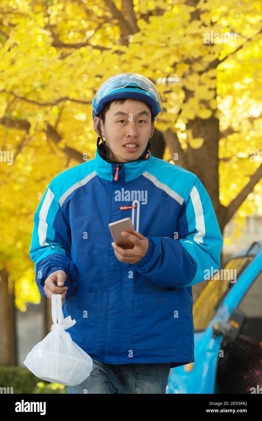 Running take-out meals Stock Photo - Alamy